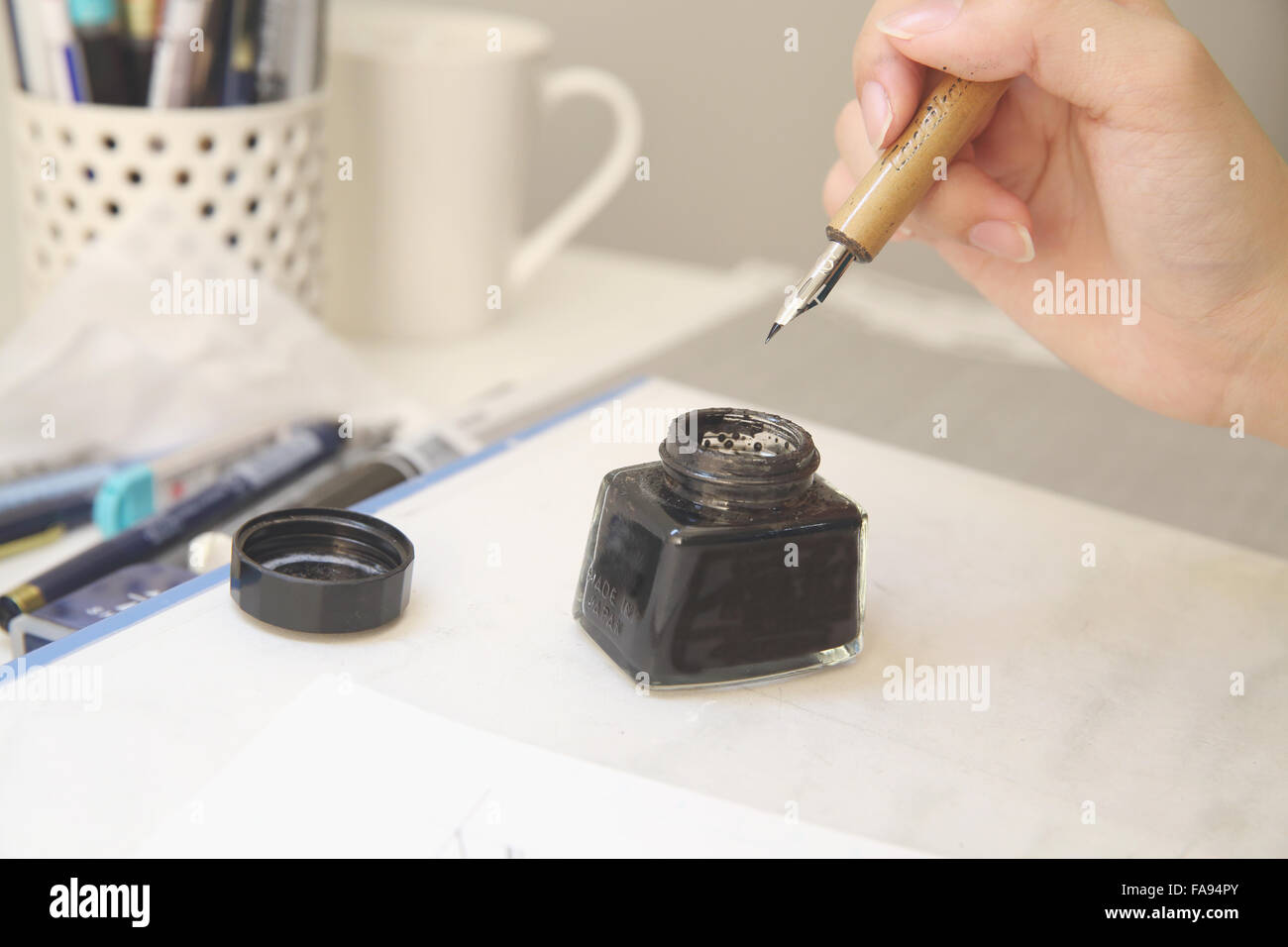 Japanese Manga artist working in the studio Stock Photo - Alamy