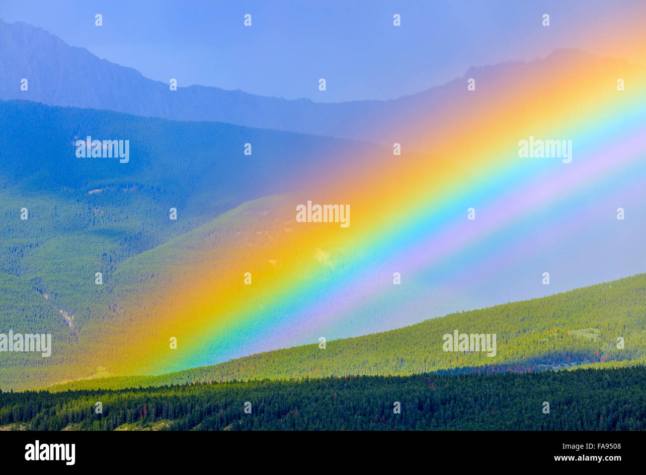 Rain bow over Colin Range in Jasper National Park Stock Photo - Alamy