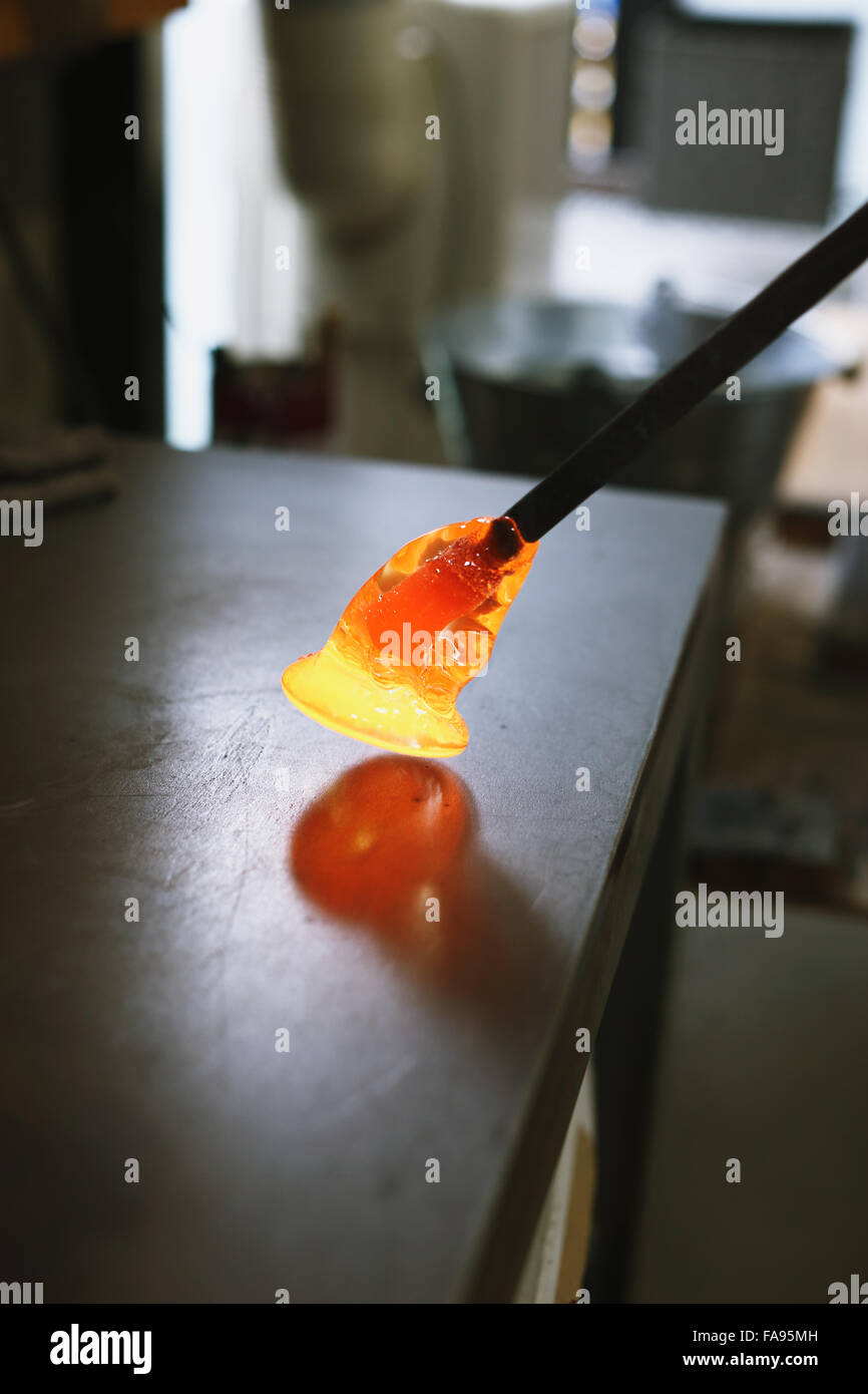 Glass being prepared in artisan studio Stock Photo - Alamy