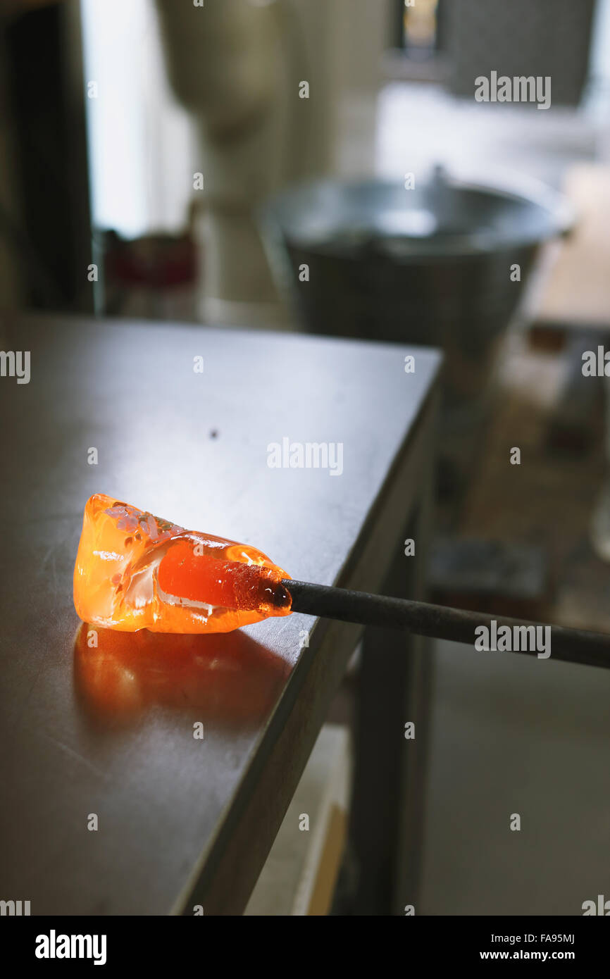 Glass being prepared in artisan studio Stock Photo - Alamy