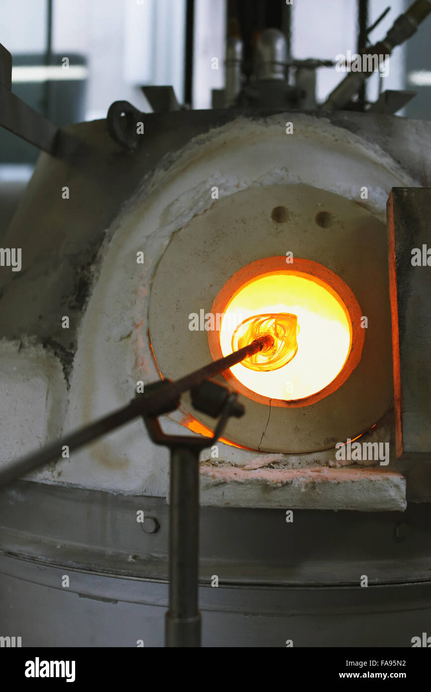 Glass being prepared in artisan studio Stock Photo - Alamy
