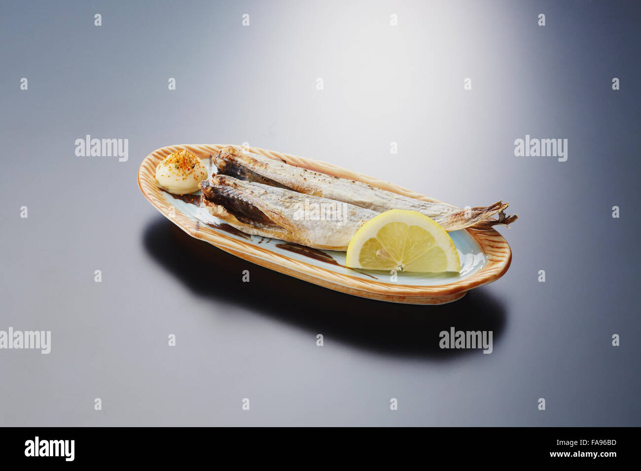 Japanese-style grilled fish Stock Photo - Alamy