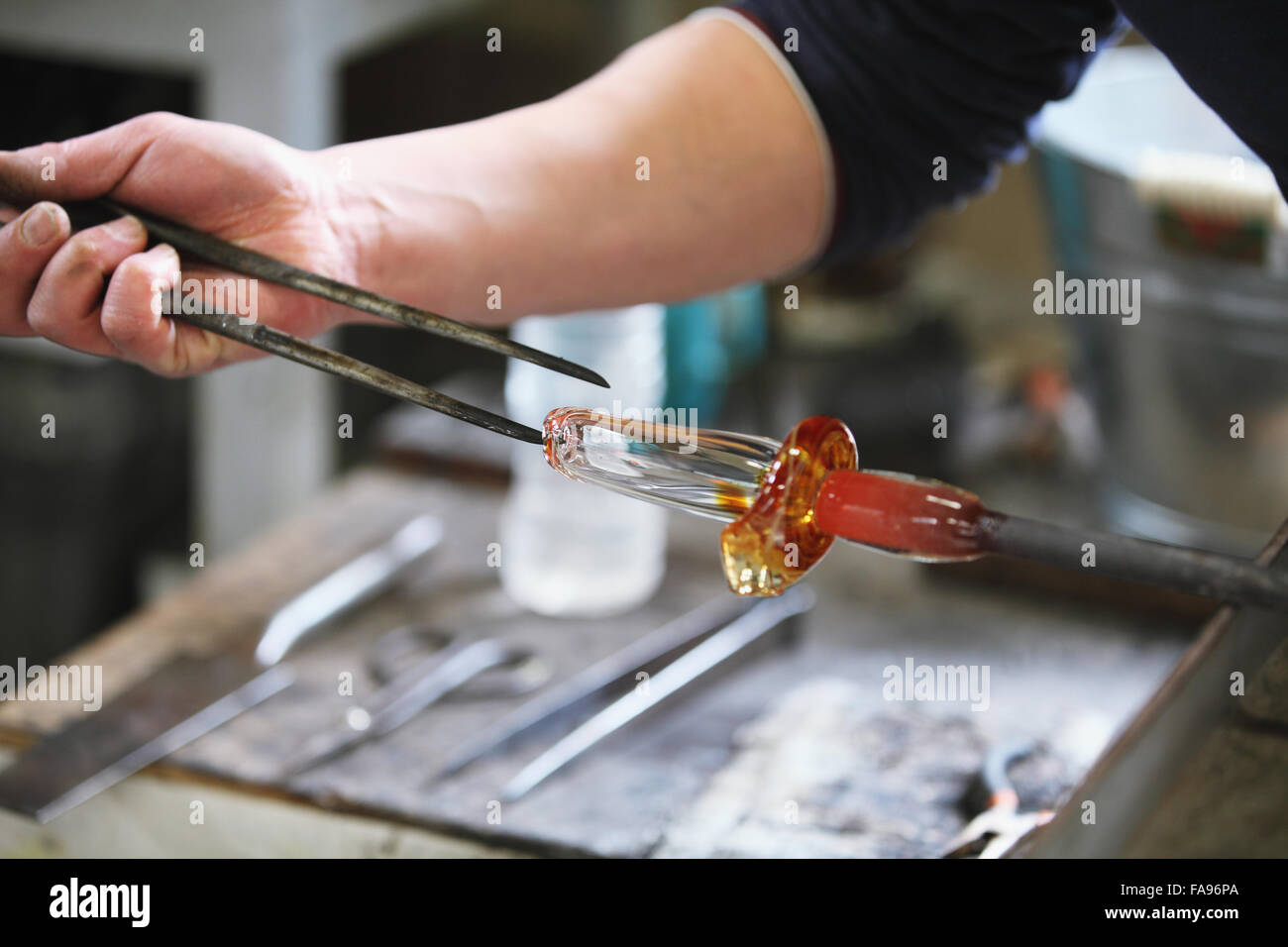 Japanese glass artisan working in the studio Stock Photo - Alamy