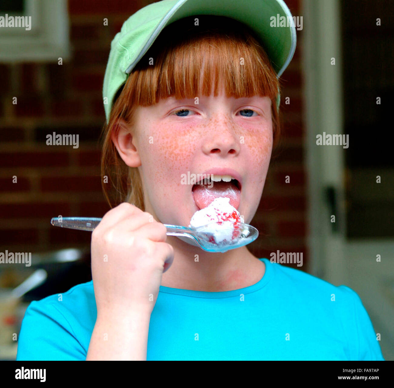 Girl eating ice cream Stock Photo - Alamy
