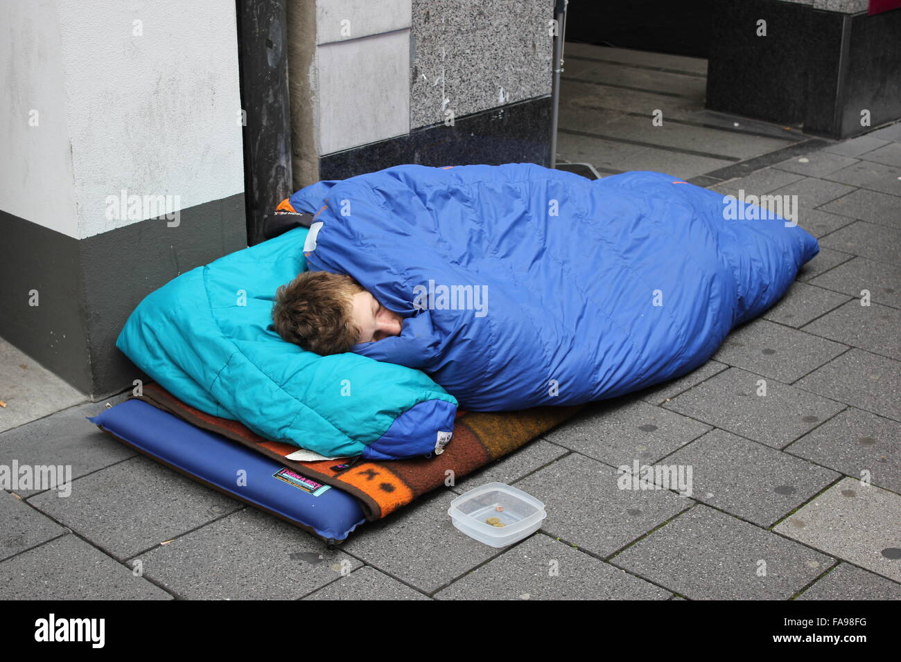 Sleeping on the street hi-res stock photography and images - Alamy