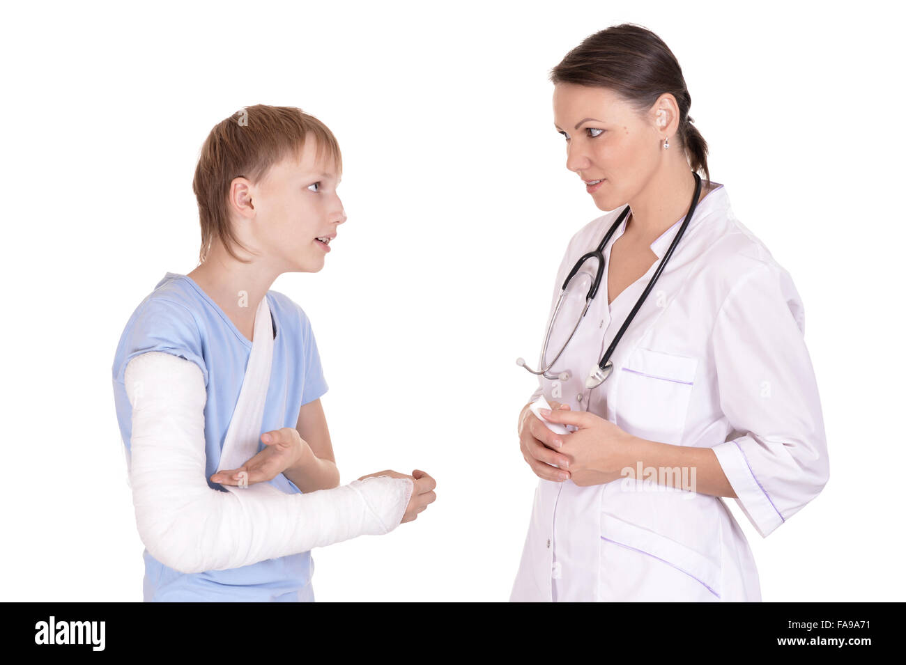 Doctor and young boy Stock Photo - Alamy