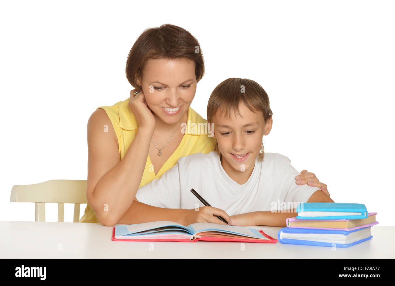 Mother and son doing homework Stock Photo - Alamy