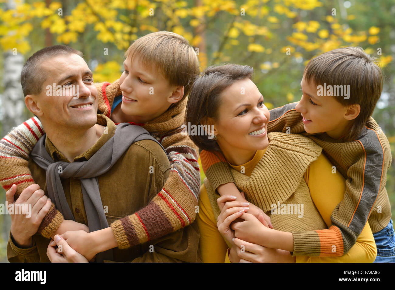 Portrait of family relaxing Stock Photo - Alamy