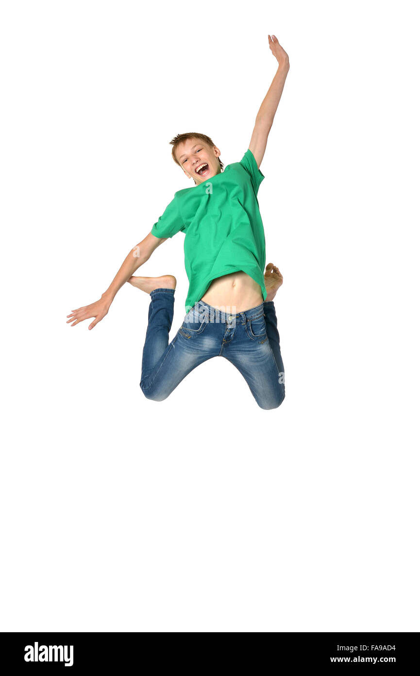 Young boy jumping Stock Photo - Alamy
