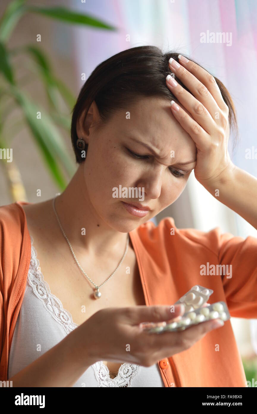 Sick woman with headach Stock Photo - Alamy