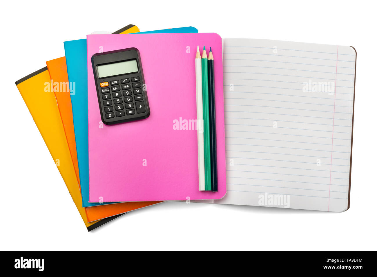 Open notebook with set of crayons and calculator Stock Photo - Alamy