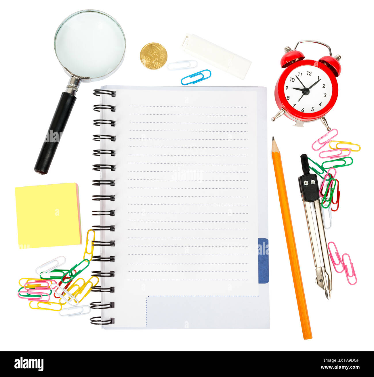 Open notebook with stationery and alarm clock Stock Photo - Alamy