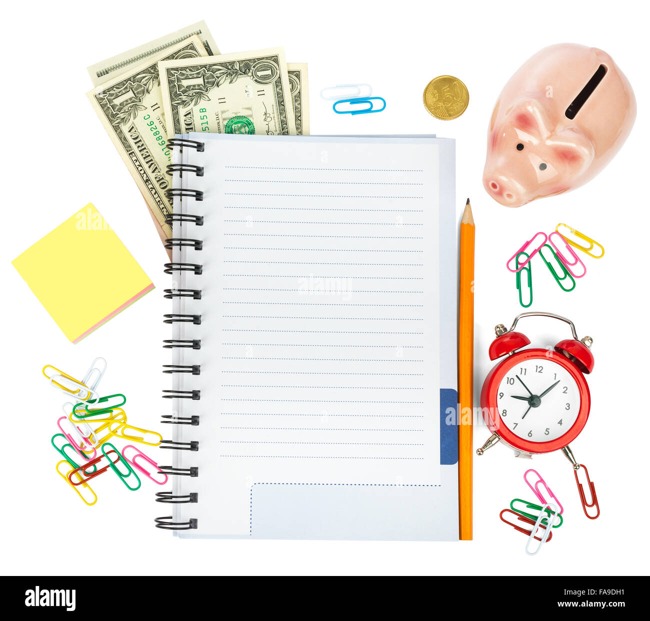 Open notebook with stationery and cash Stock Photo - Alamy
