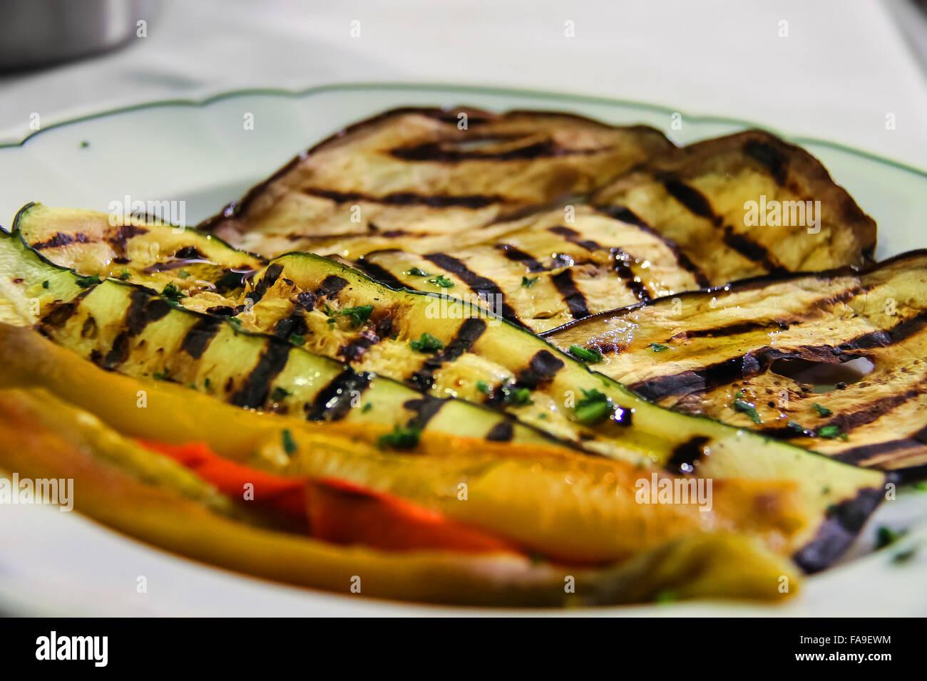 Plate with grilled vegetables in traditional Italian restaurant Stock ...