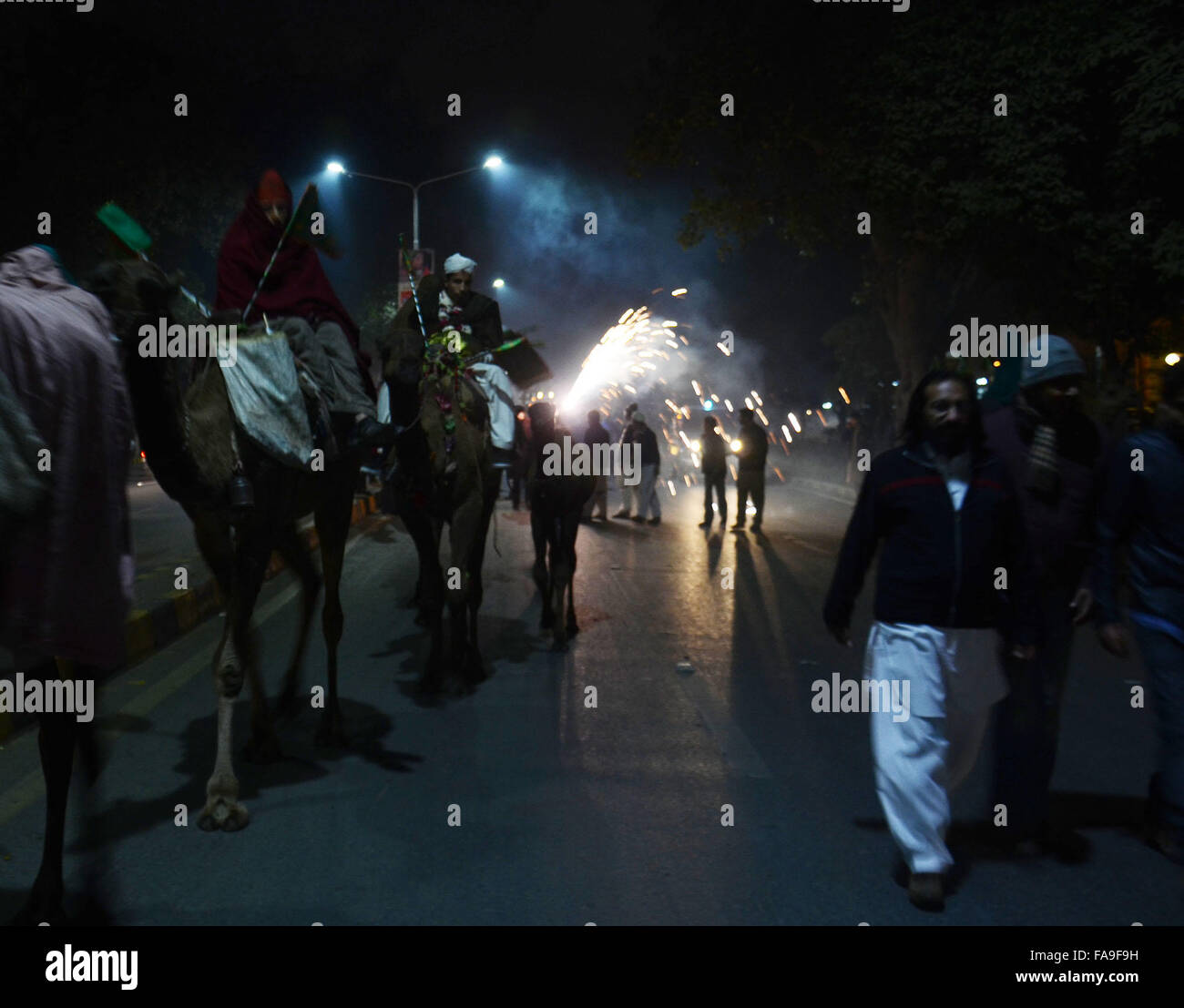 Lahore, Pakistan. 23rd Dec, 2015. Pakistani Muslims lights fireworks ...