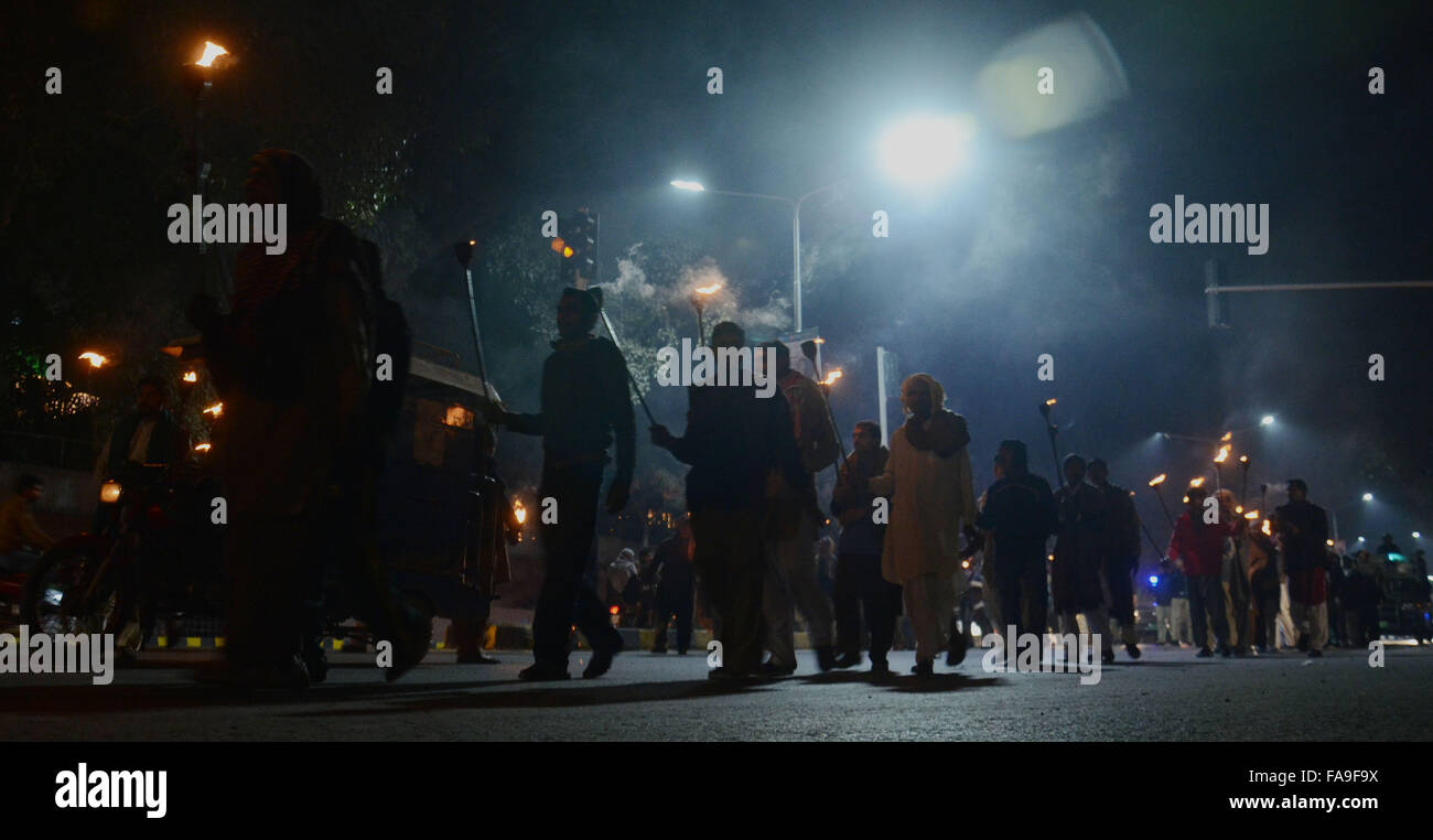 Lahore, Pakistan. 23rd Dec, 2015. Pakistani Muslims lights fireworks ...