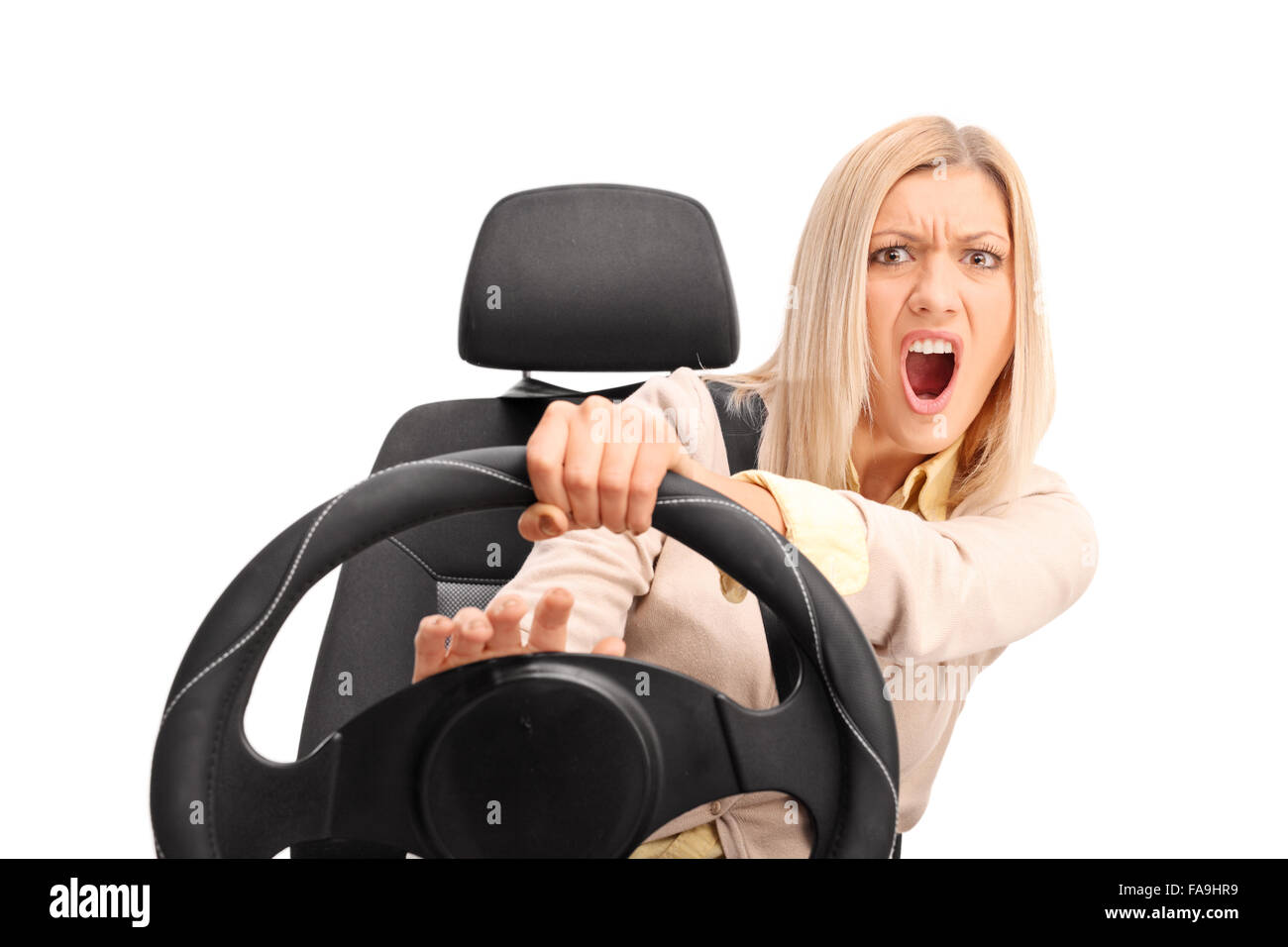 Angry female driver yelling and honking on the horn isolated on white ...