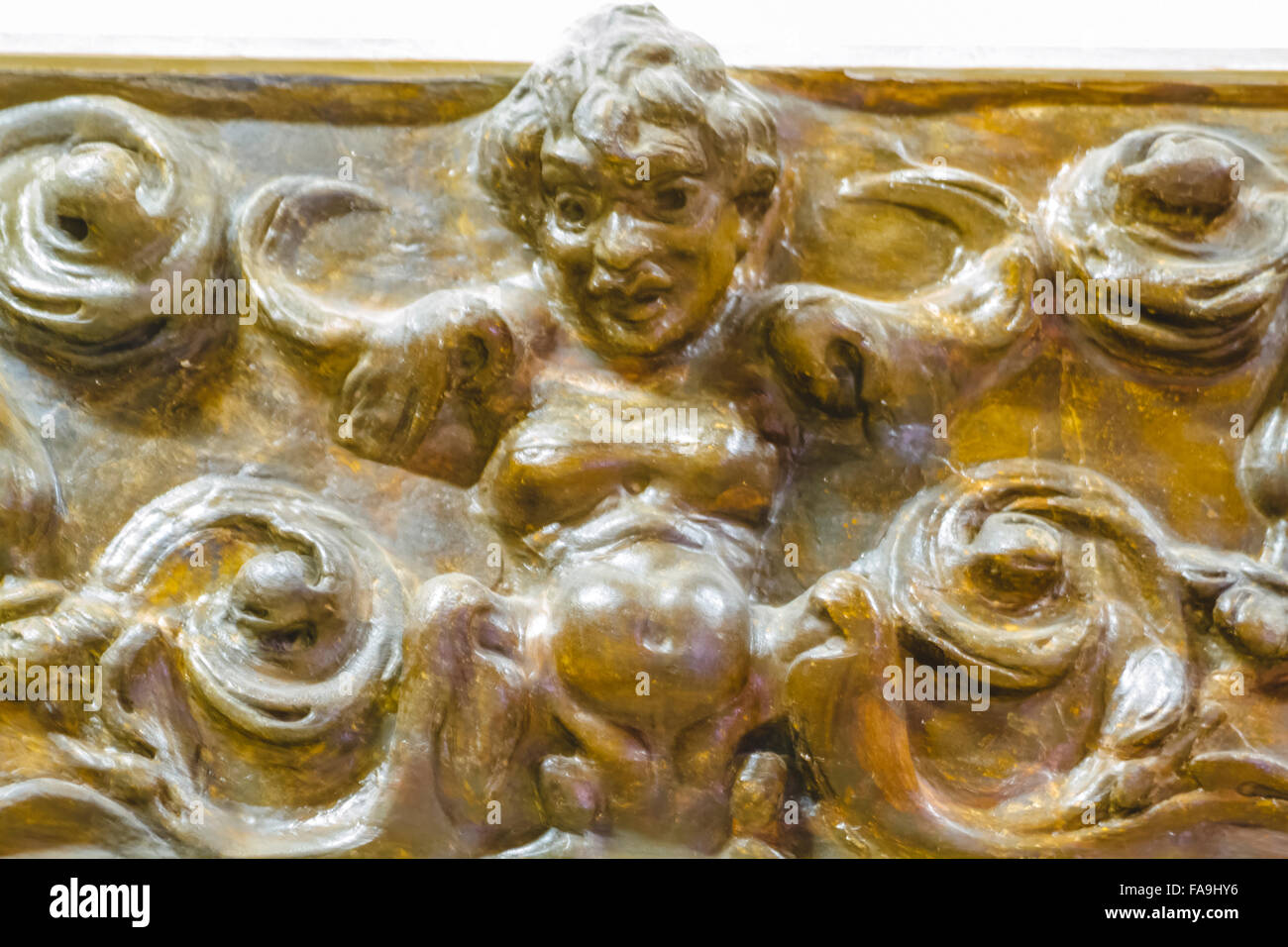 stone relief with figures inside a church Stock Photo - Alamy