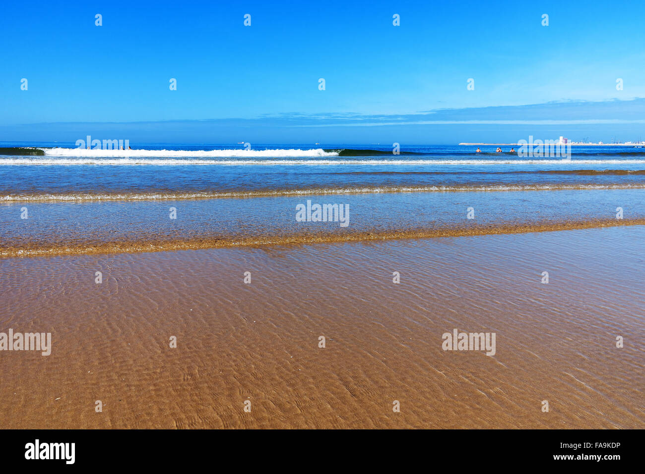 Sand beach and Blue Ocean Stock Photo - Alamy