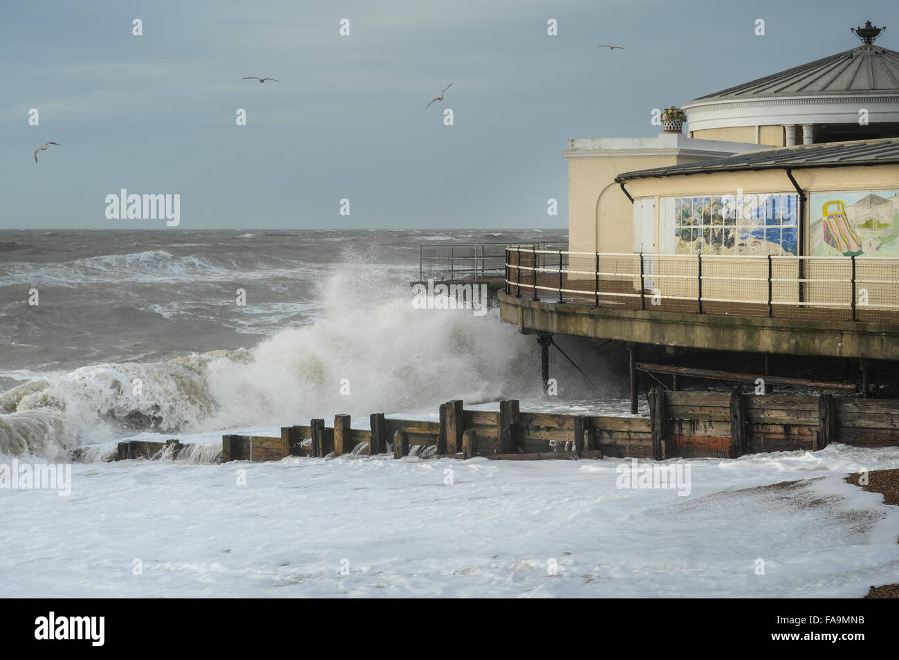 Large waves, caused by Storm Eva, crash onto the beach under Worthing ...