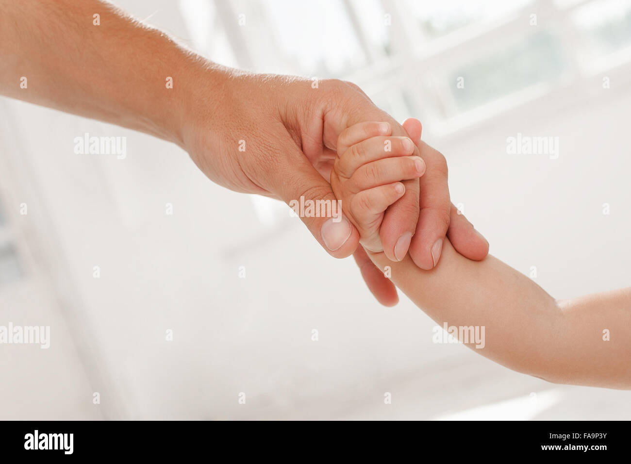 father giving hand to a child Stock Photo - Alamy