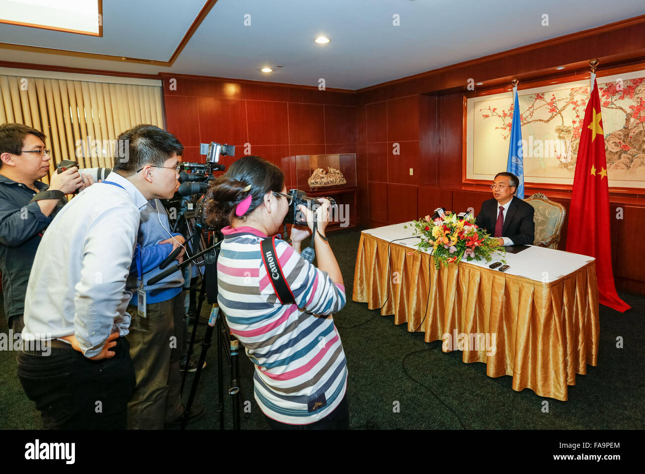 New York, USA. 24th Dec, 2015. Wang Min (R), China's deputy permanent ...