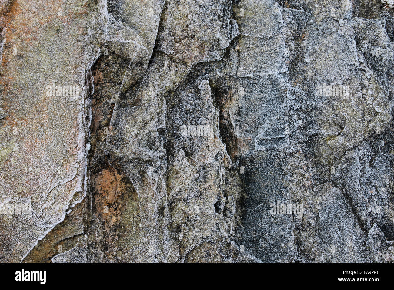 Frost patterns on rock face Stock Photo - Alamy