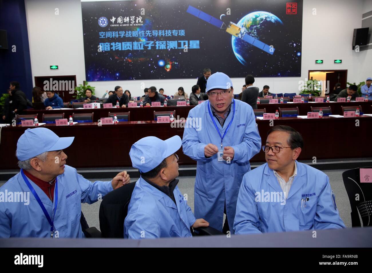 Beijing, China. 24th Dec, 2015. Personnels of the National Space ...