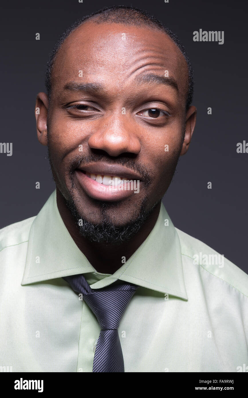portrait of handsome young black african smiling man Stock Photo - Alamy