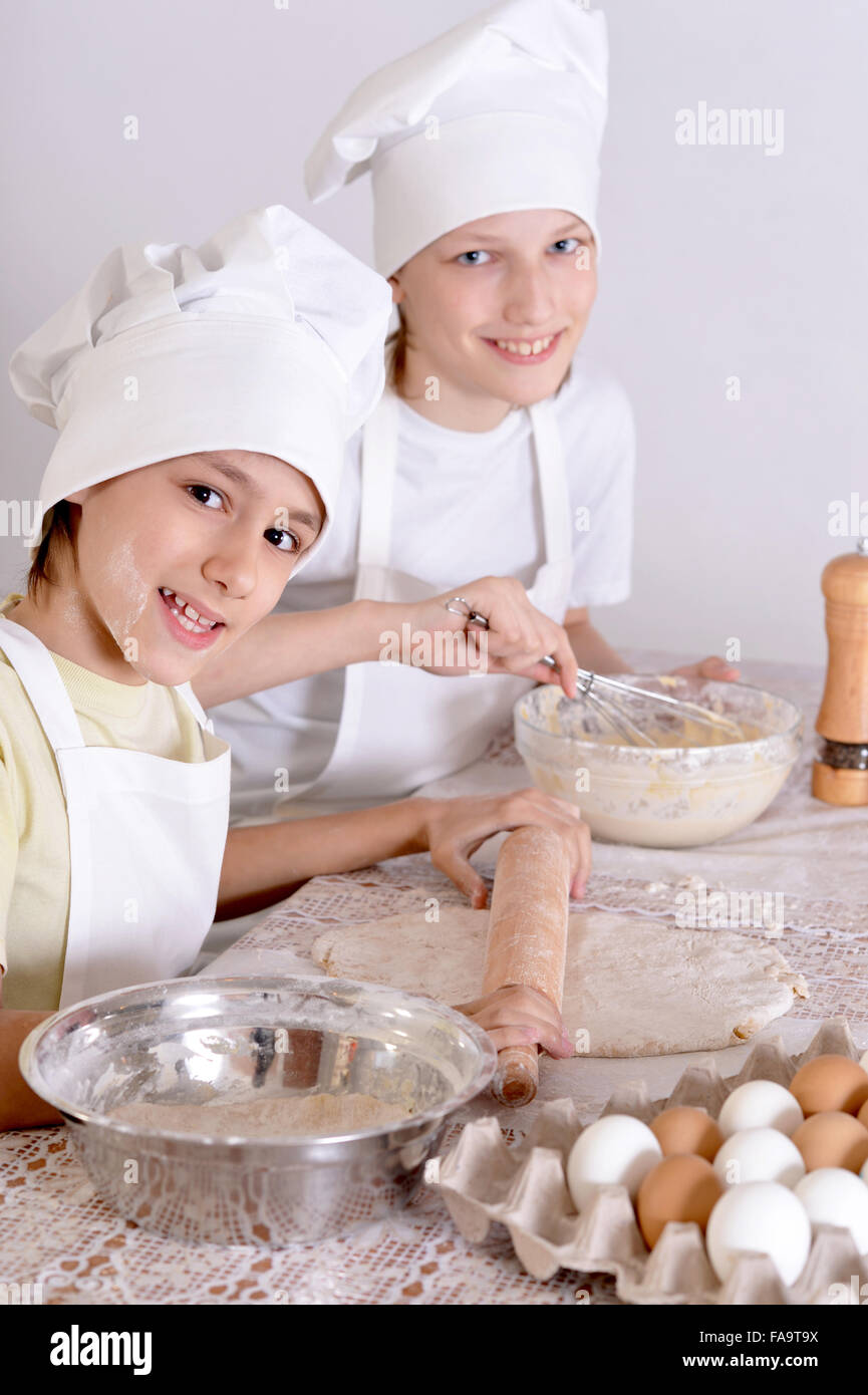 Boys preparing dinner Stock Photo - Alamy