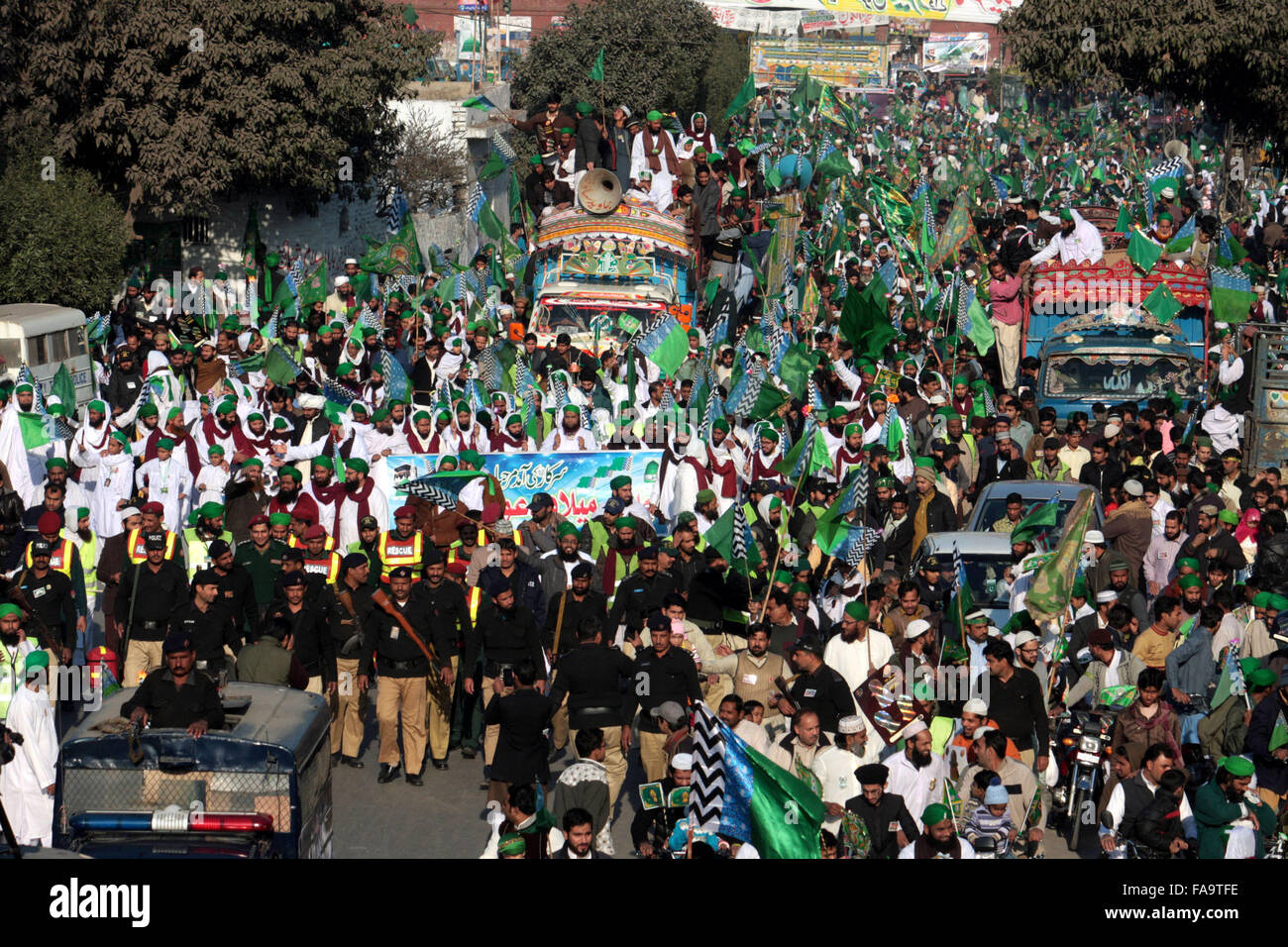 Lahore, Pakistan. 24th Dec, 2015. Pakistani Muslims march during the ...