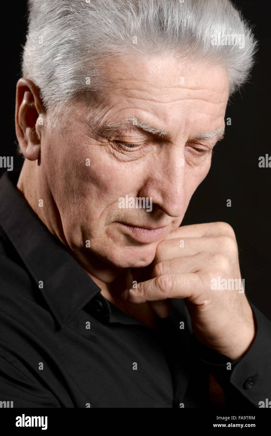Sad senior man Stock Photo - Alamy