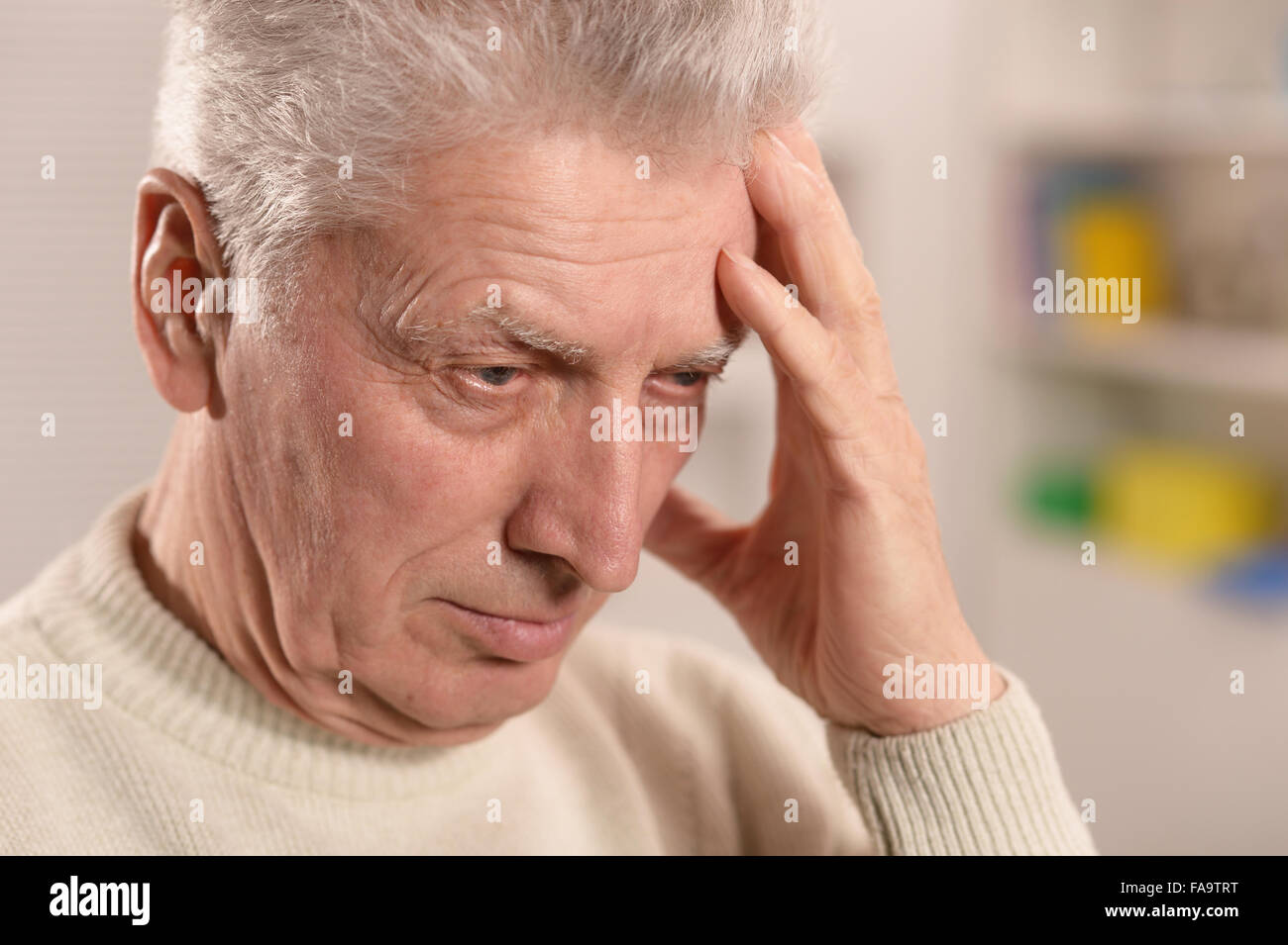 Sad senior man Stock Photo - Alamy