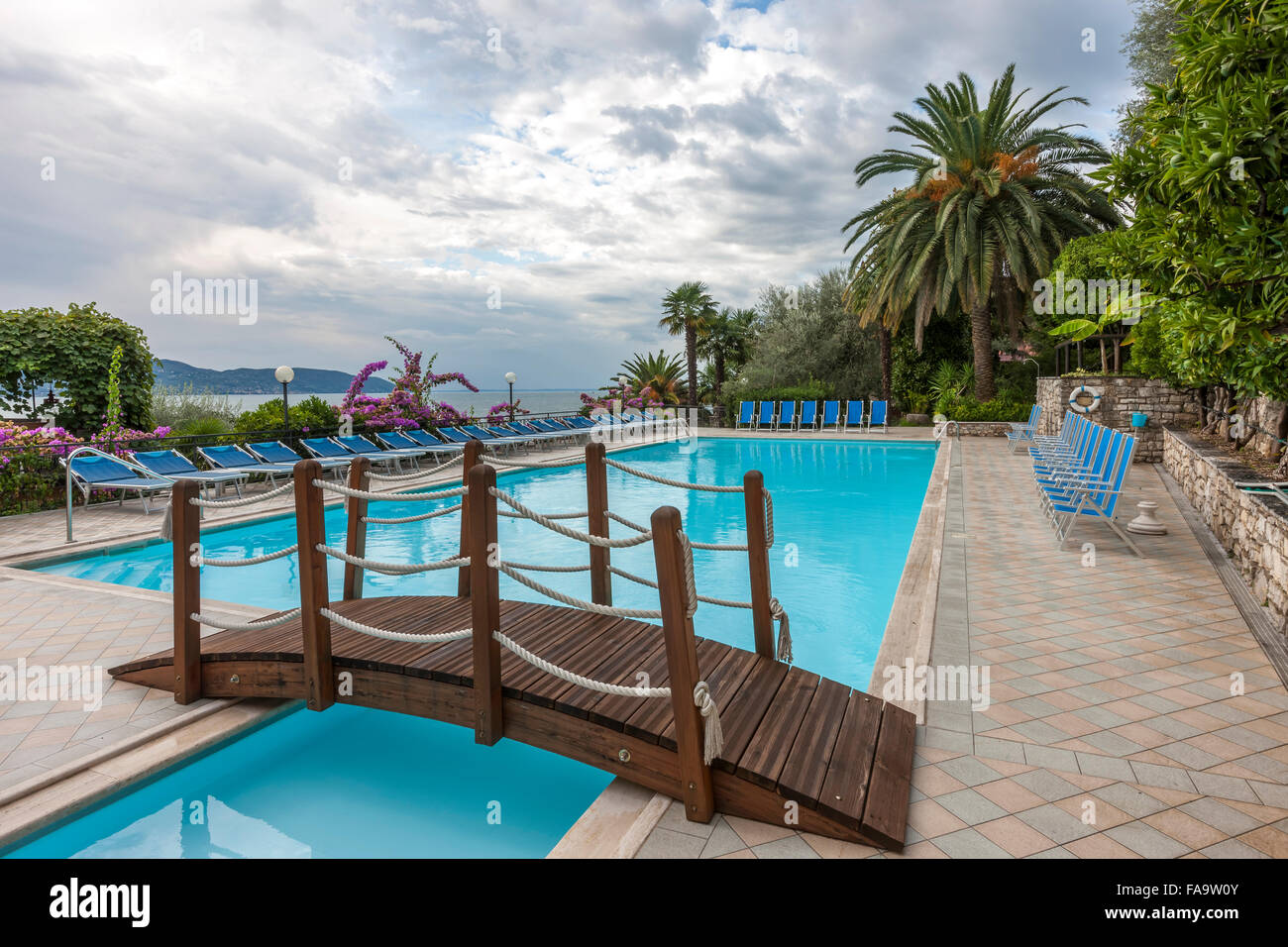 Luxury swimming pool with beautiful views of Lake Garda in Italy Stock ...
