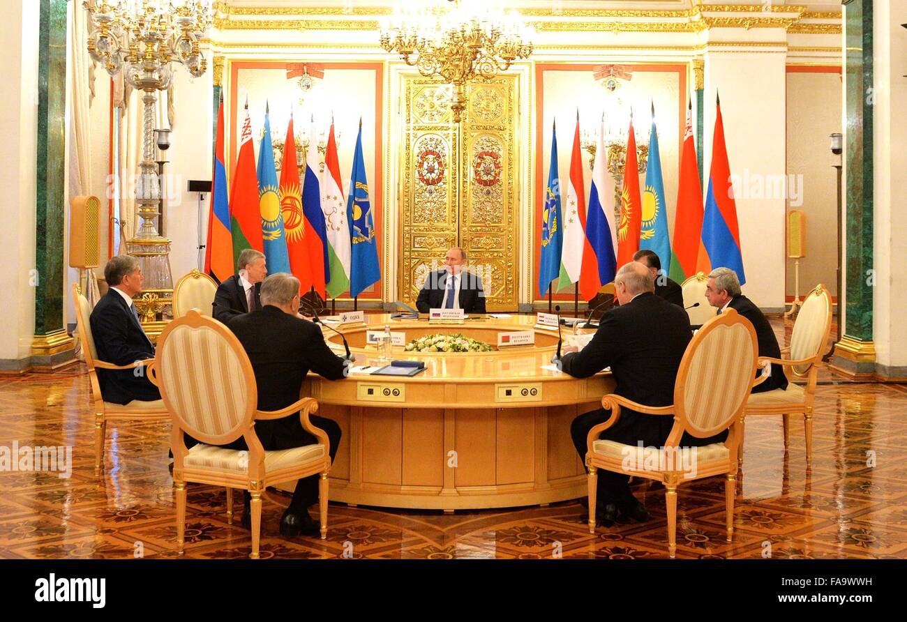 Russian President Vladimir Putin, center, participates in a meeting of ...