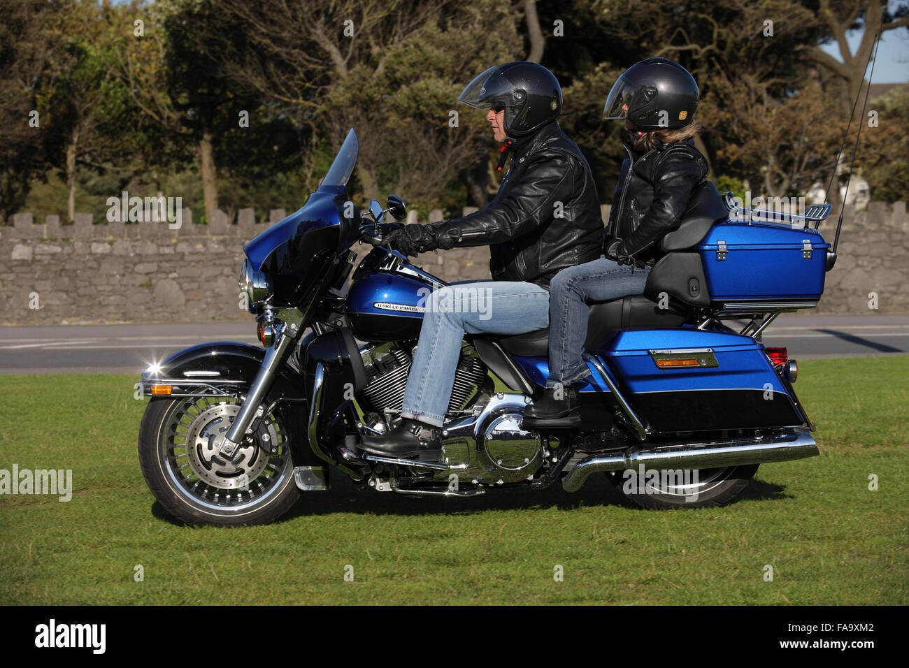 Biker couple on harley davidson hi-res stock photography and images - Alamy