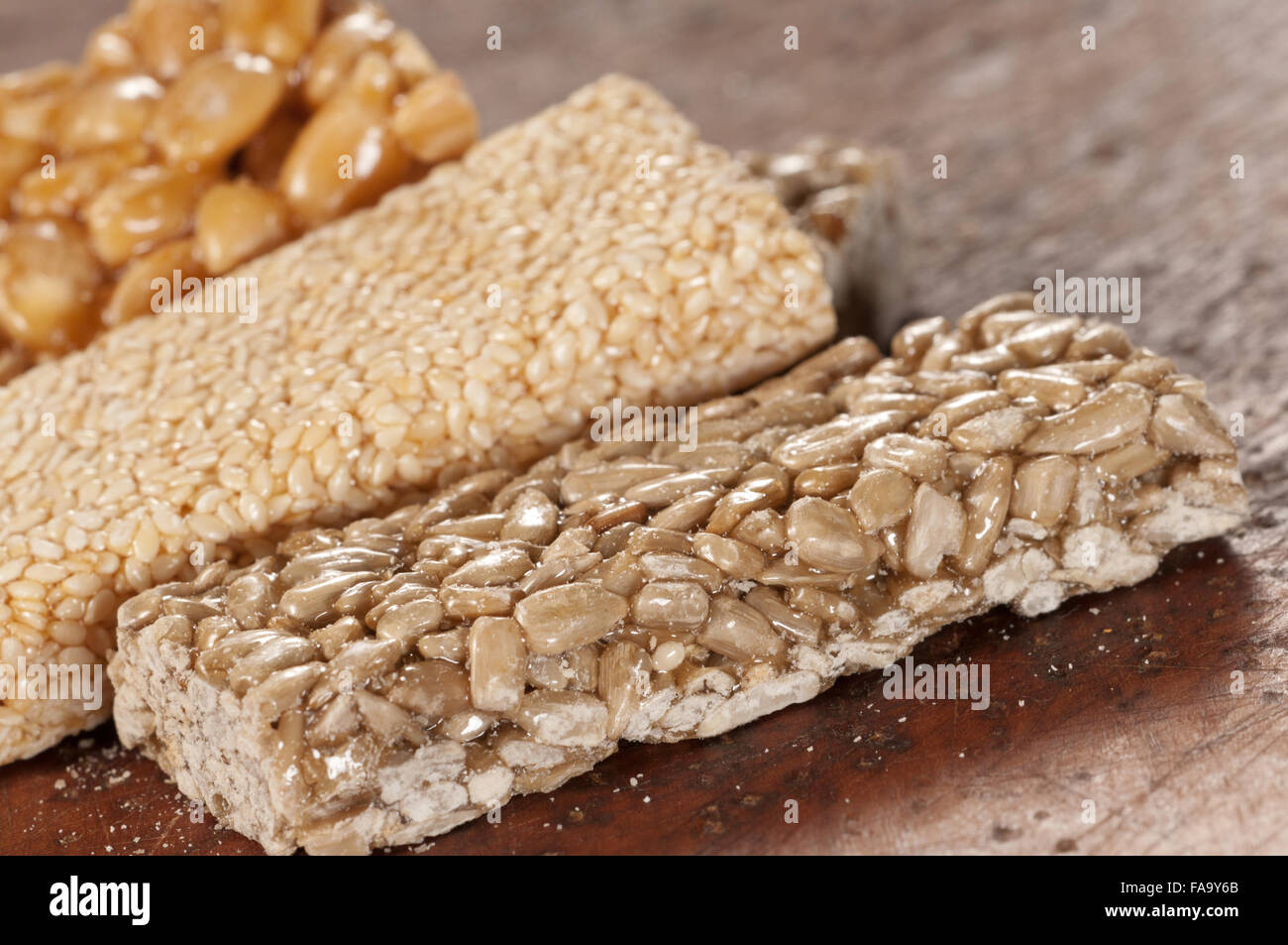 Brittle collection on a timber board, macro sho Stock Photo - Alamy