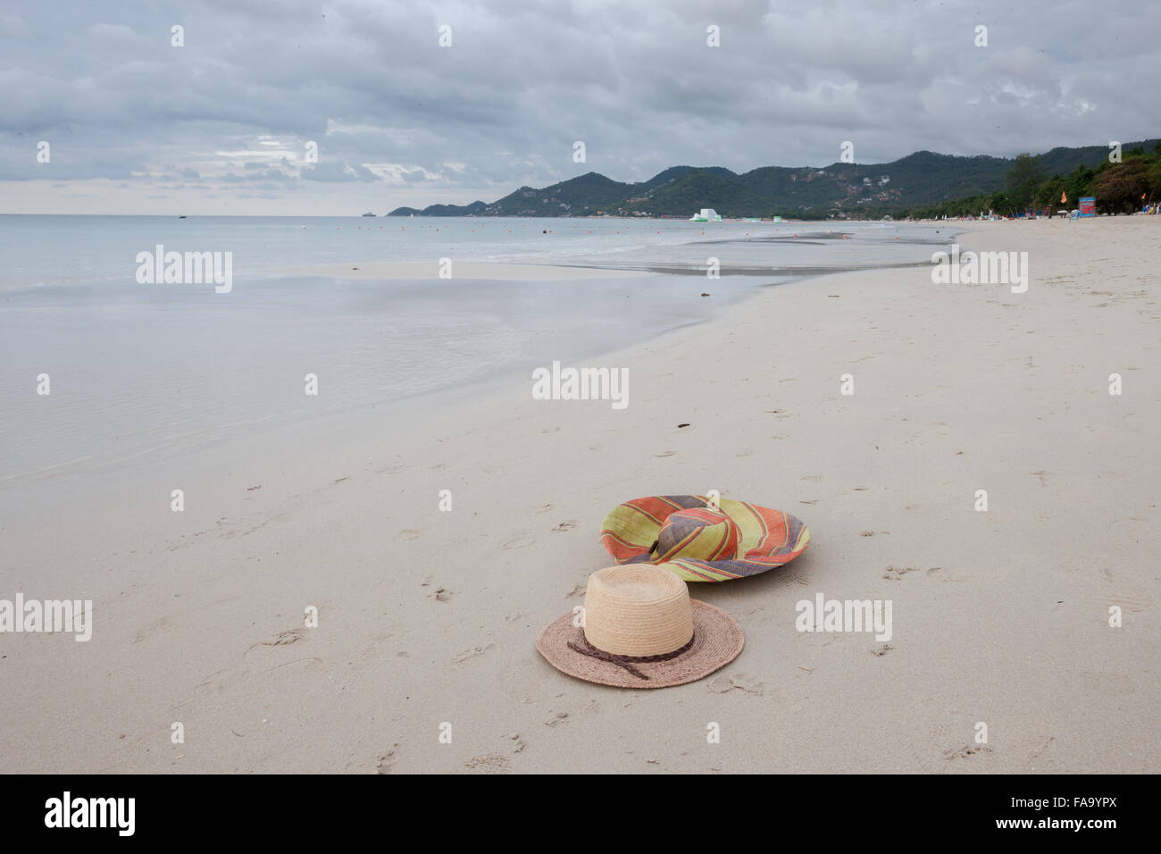 Beach on tropical island. Clear blue water, sand, clouds Stock Photo ...