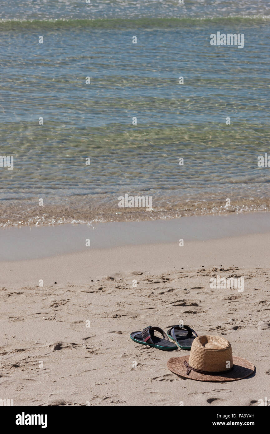 Beach on tropical island. Clear blue water, sand, clouds Stock Photo ...