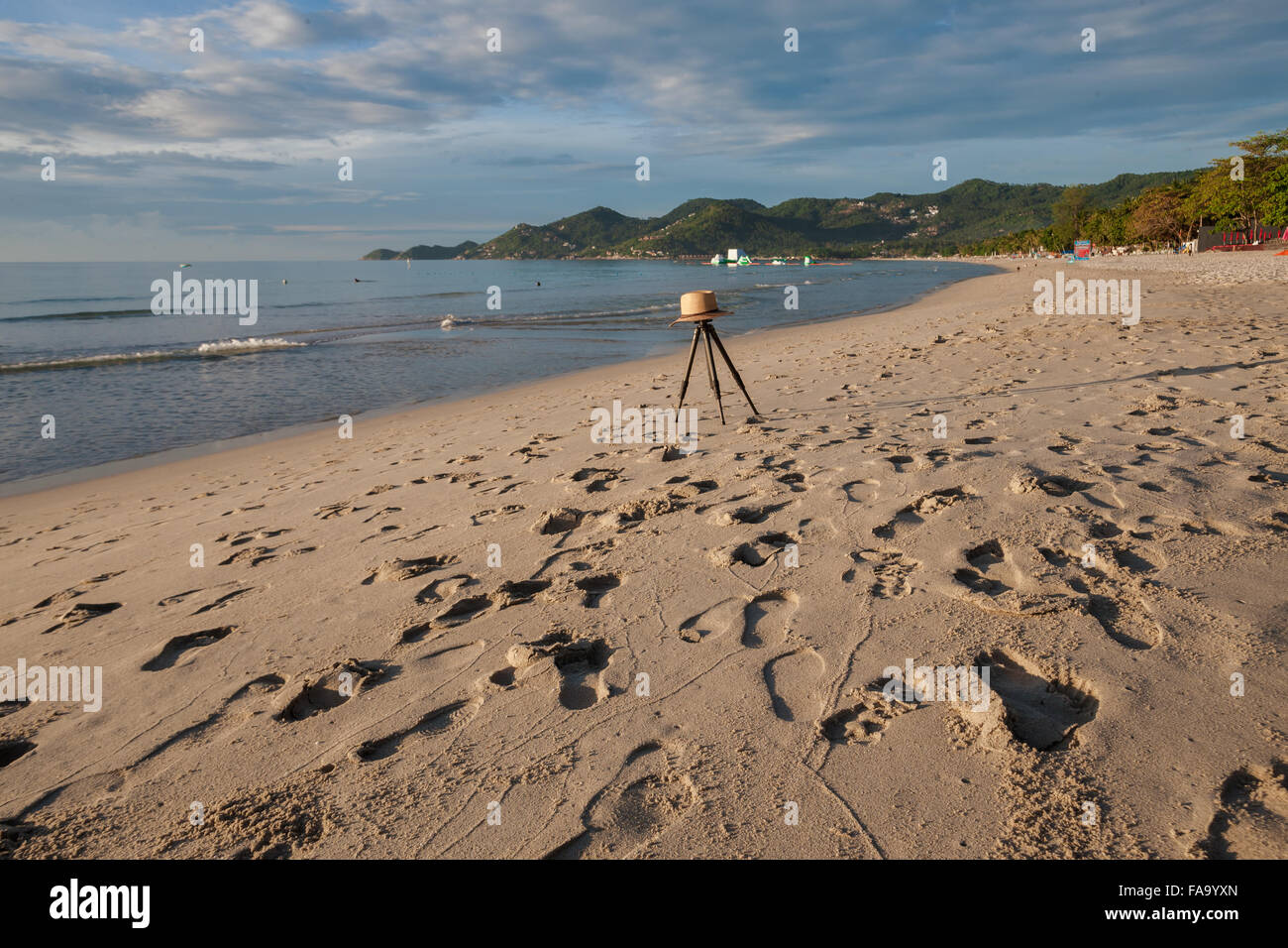 Beach on tropical island. Clear blue water, sand, clouds Stock Photo ...