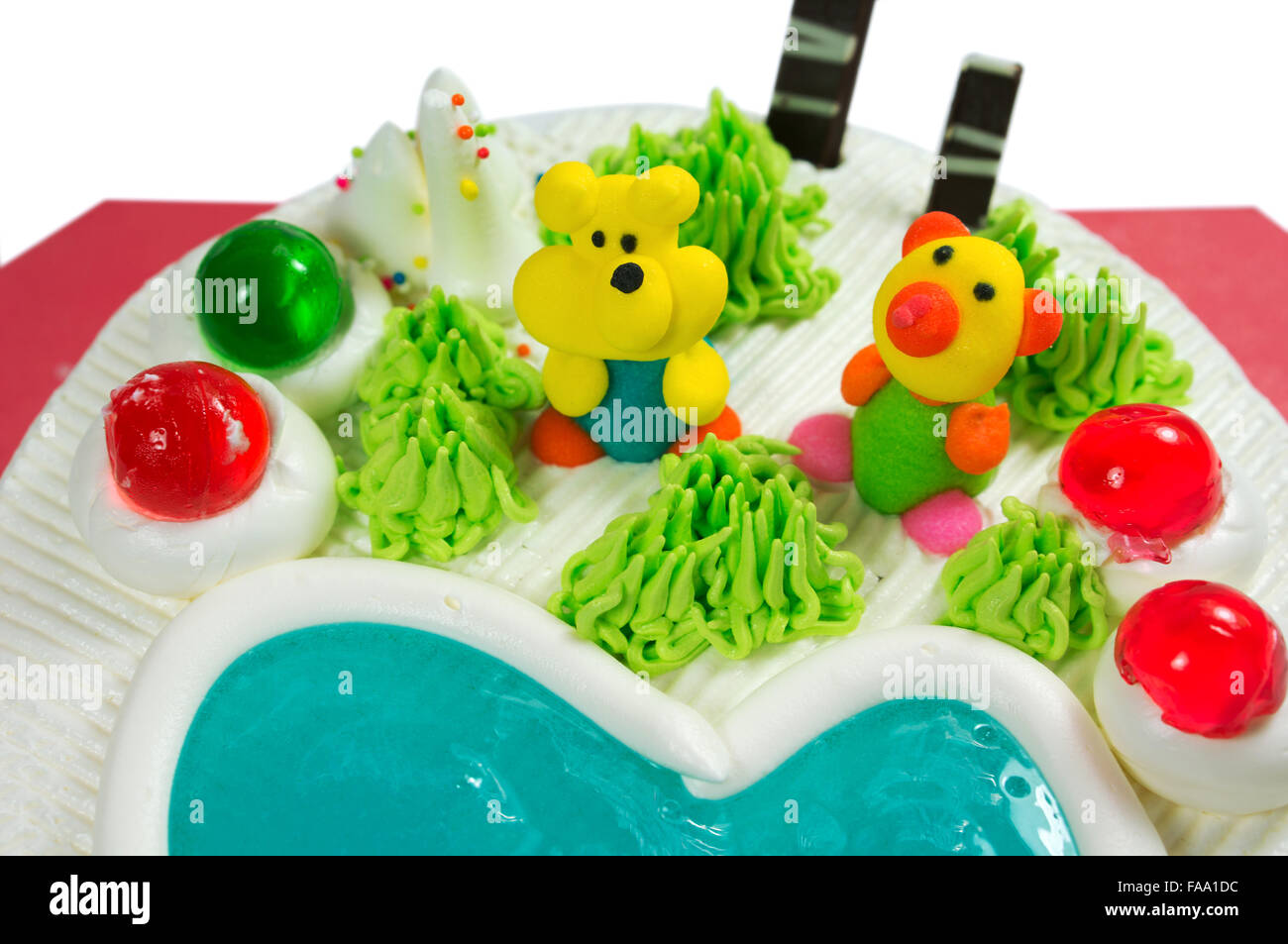 Fancy cake with sugar cartoon and jelly closeup Stock Photo - Alamy