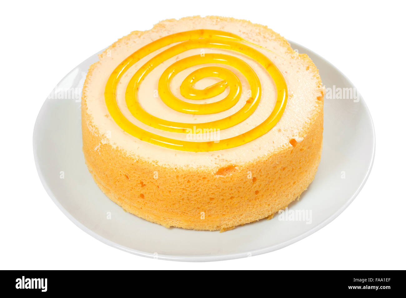 Sponge orange cake with spiral jam on plate isolated on white ...