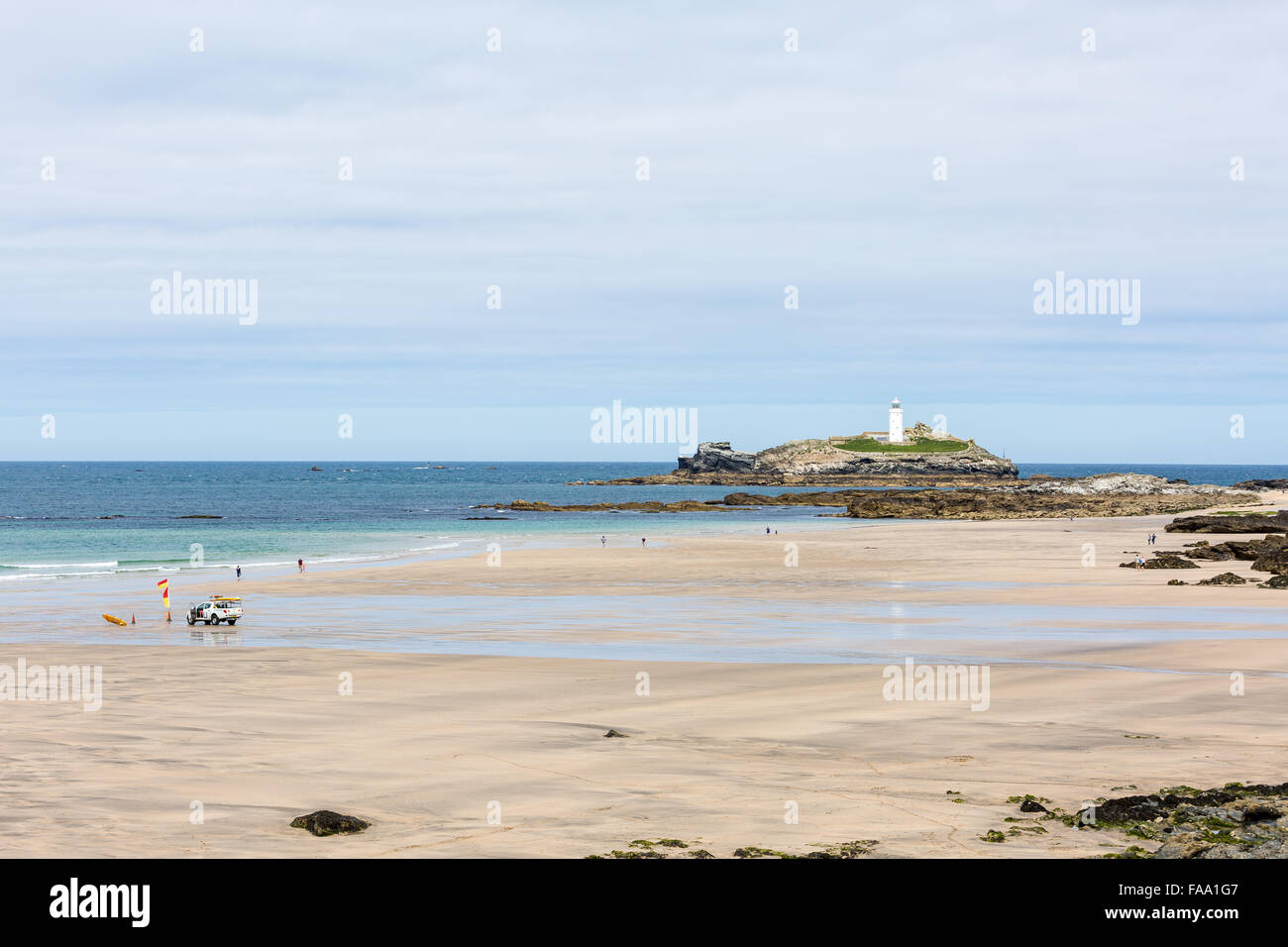 The Godrevy Lighthouse, Cornwall, UK. The lighthouse is a white ...