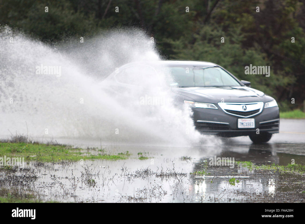 Puddle throwing hi-res stock photography and images - Alamy