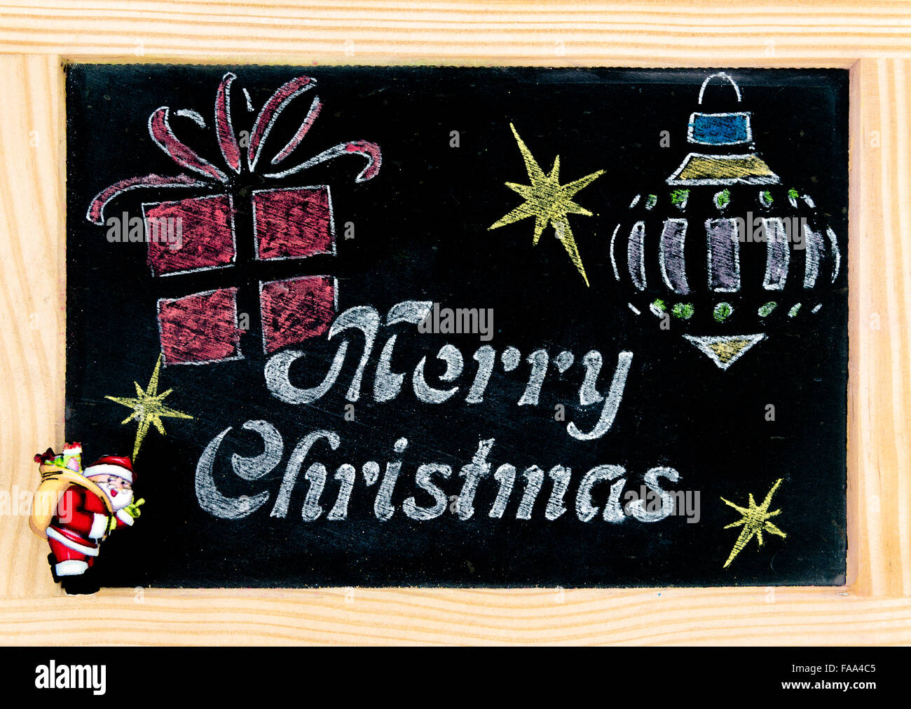 Wooden frame vintage chalkboard with Merry Christmas message and Santa ...