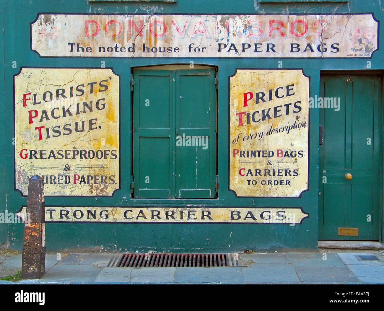 Old Victorian London shop front with original painted name of paper bag ...