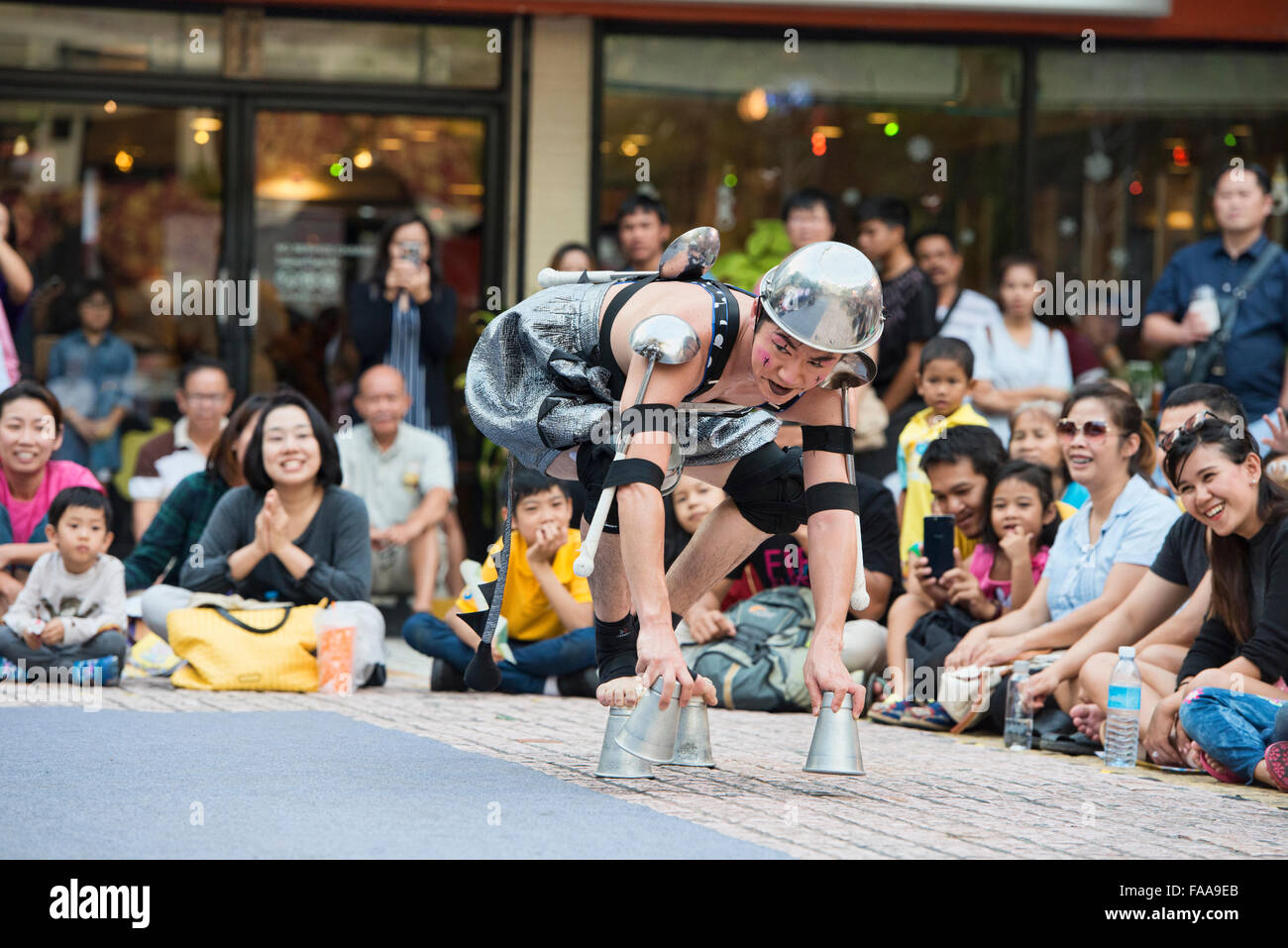 Comic juggler at a street festival in Bangkok, Thailand Stock Photo - Alamy