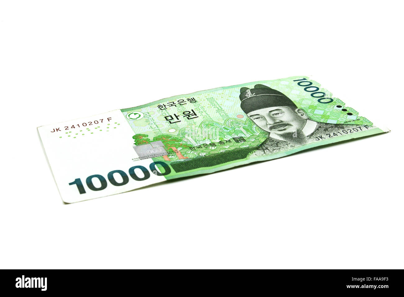 Korean Won currency bills isolated on white background Stock Photo - Alamy