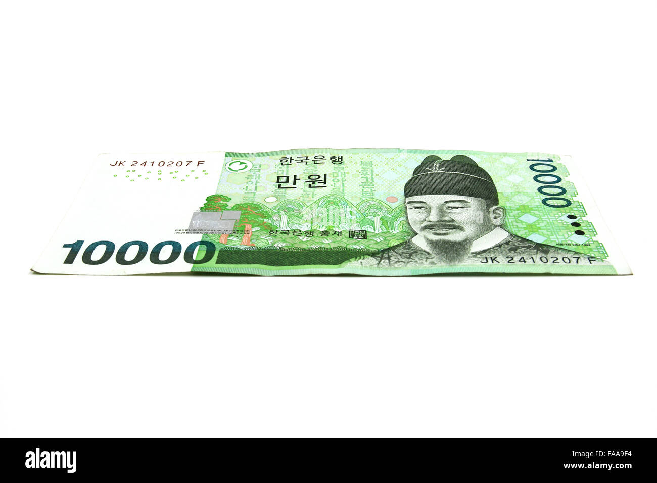 Korean Won currency bills isolated on white background Stock Photo - Alamy