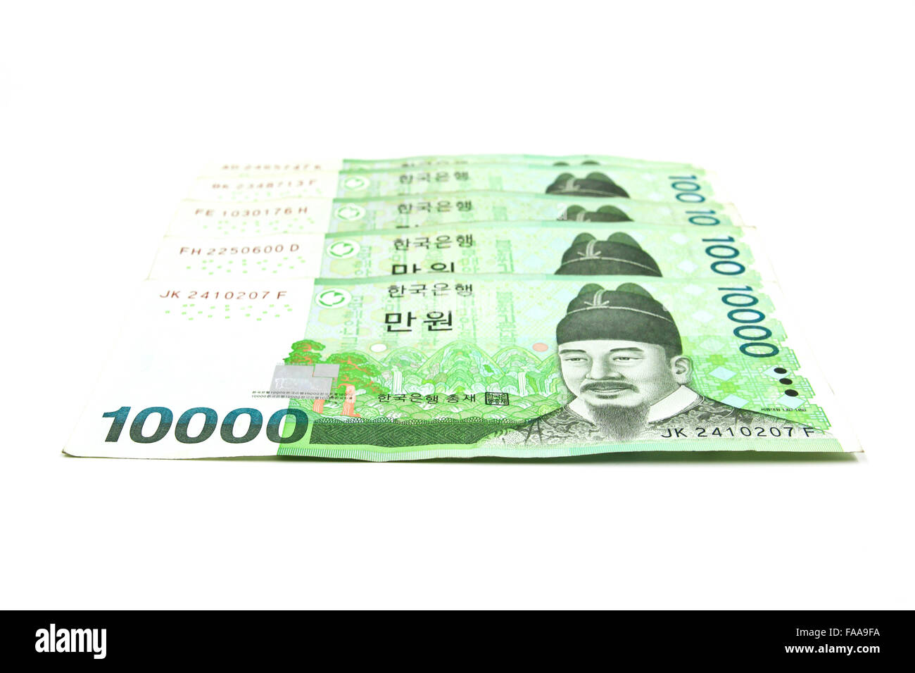 Korean Won currency bills isolated on white background Stock Photo - Alamy